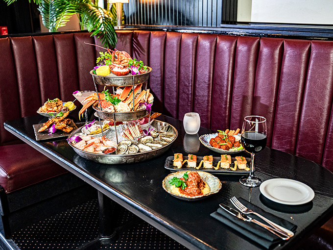 A multi-tiered seafood tower that's practically architectural – layers of crustacean luxury that transform dinner into a celebration worth remembering.