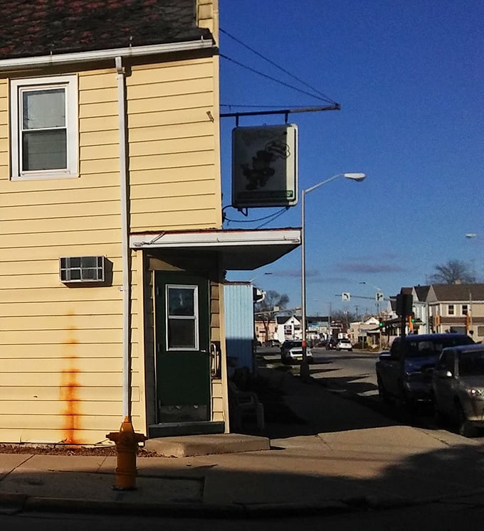 The exterior view shows Sully's modest presence on the street &ndash; like that quiet classmate who turned out to be wildly successful.