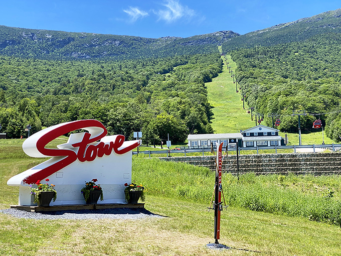 The iconic Stowe sign welcomes visitors to Vermont's recreational paradise, with Mount Mansfield's slopes promising adventure in every season.