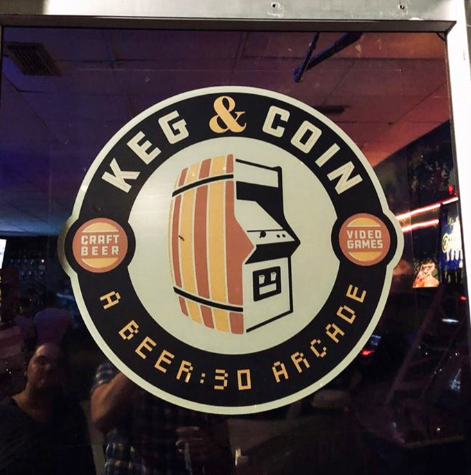 The iconic logo perfectly captures Keg & Coin's dual identity &ndash; where barrel-aged goodness meets quarter-fueled nostalgia in perfect harmony.