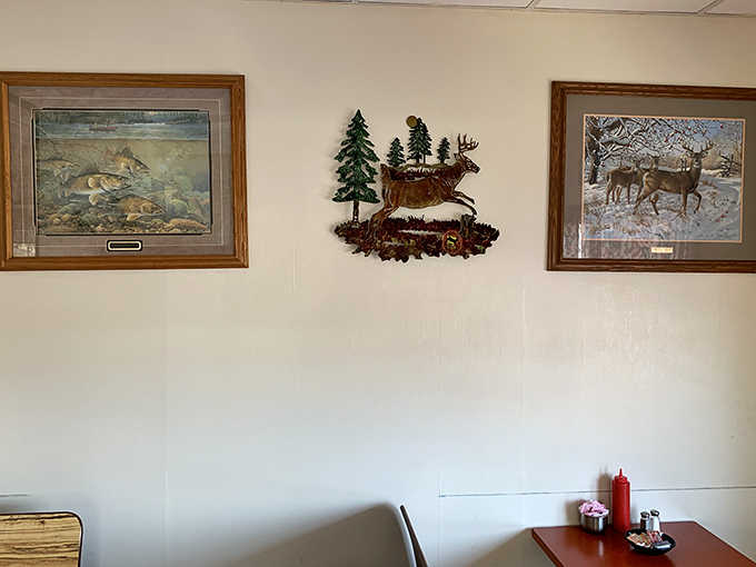 Decor that tells the story of place &ndash; fishing prints and wildlife art that remind you you're in the North Woods.