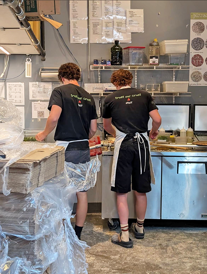 The staff at Folino's don't just make pizza; they craft edible art with practiced hands and a commitment to quality evident in every movement.