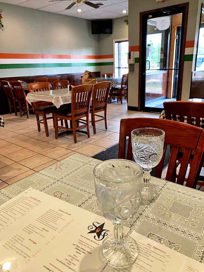 A dining room where the colors of the Indian flag adorn the walls &ndash; simple, welcoming, and focused on what matters most: the food.