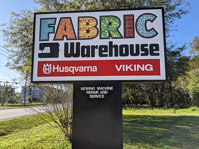 The sign announces your arrival at textile paradise, where Husqvarna and Viking aren't just brands&mdash;they're lifestyle choices.
