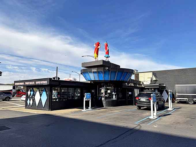 The distinctive drive-in layout preserves the car culture of mid-century America, when dining in your automobile was the height of convenience.