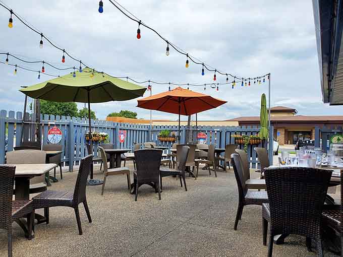 Colorful umbrellas and string lights transform the patio into your new favorite warm-weather dining destination.