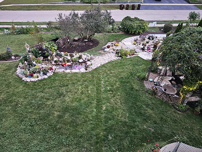 Gardens this well-tended don't happen by accident, they're the result of someone who understands that outdoor spaces deserve as much attention as indoor ones.