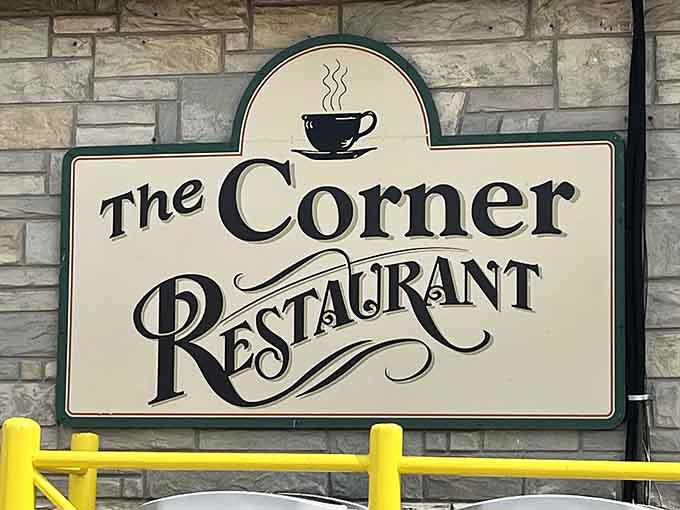 The sign says it all with classic lettering and a steaming coffee cup, promising comfort food and warm welcomes just beyond the door.