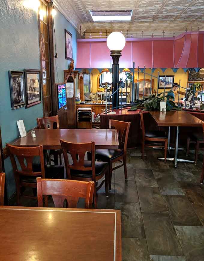 The dining room's mix of booths and tables creates spaces for every occasion, from family dinners to catching up with old friends.