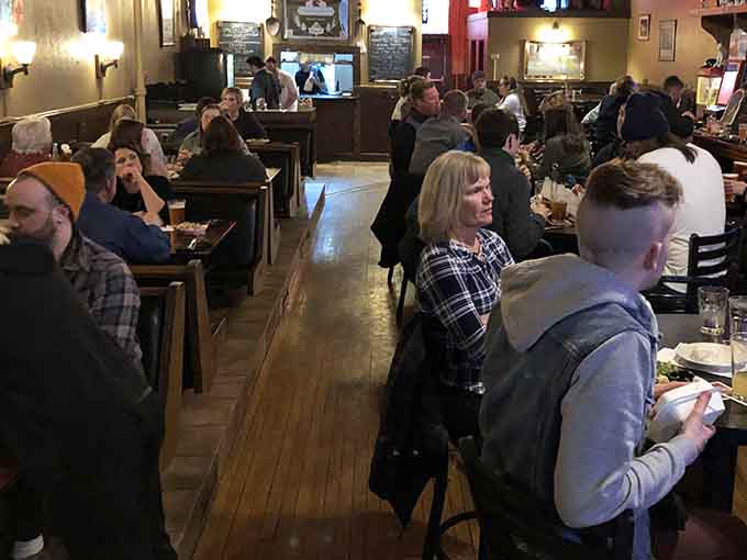 A packed dining room full of happy people is always a good sign, especially when they're all fighting over the last Brussels sprout.