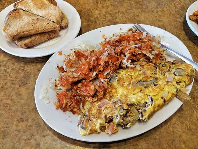 The kitchen sink approach to breakfast &ndash; every meat and vegetable harmoniously combined under a blanket of eggs.