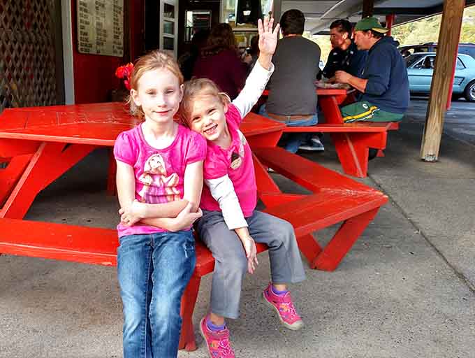 Pilgrims at the altar of great burgers &ndash; visitors proudly documenting their discovery of what locals have treasured for generations.