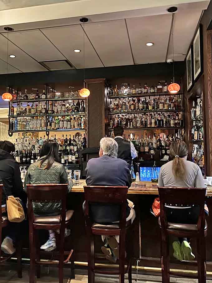 The well-stocked bar offers the perfect perch for solo diners or anyone who appreciates a good cocktail with their meal.