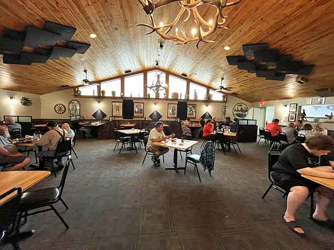 The dining room's curved ceiling adds architectural interest to a space where the real stars are on the plates, not the walls.