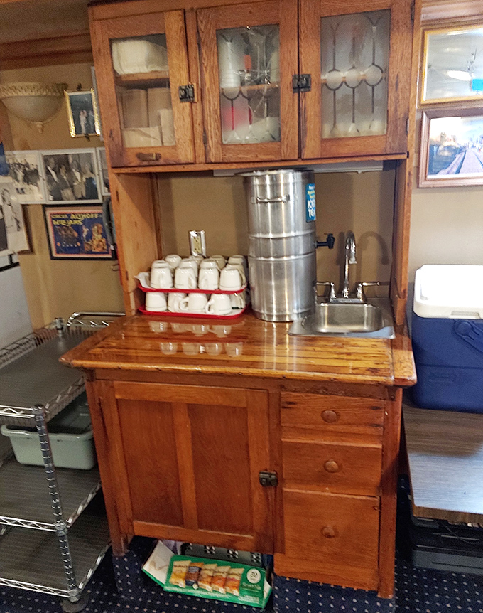 The vintage wooden hutch serving as a coffee station perfectly captures Bob's Train's charm &ndash; functional history that enhances the dining experience.
