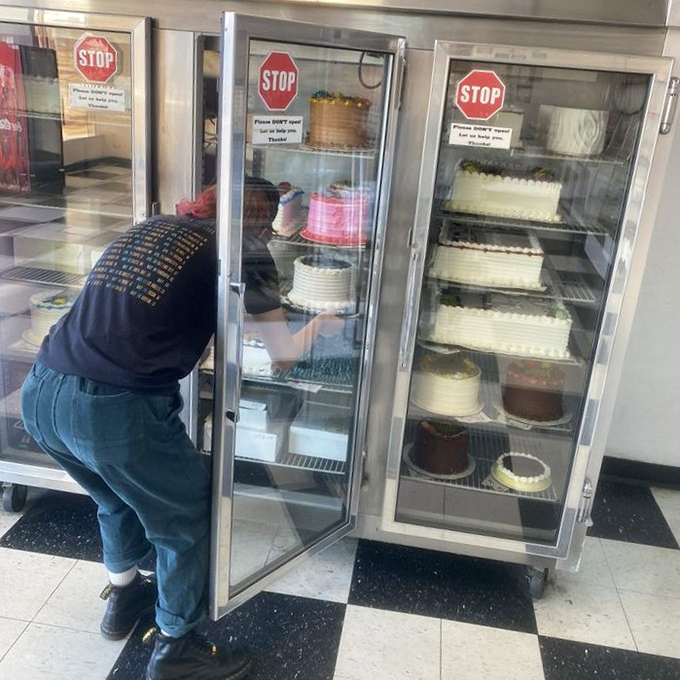 Behind these refrigerator doors lie celebration cakes waiting for their moment to shine at birthdays, anniversaries, and life's sweetest milestones.