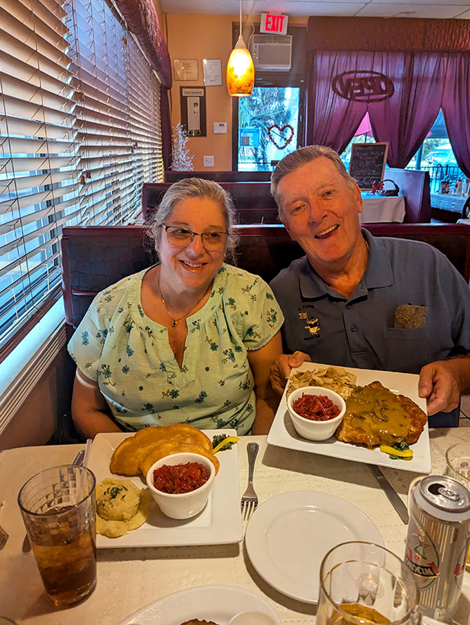 Happy diners sharing a moment of pure food joy &ndash; the universal language of "this tastes amazing" needs no translation at Anna's Polish Restaurant.