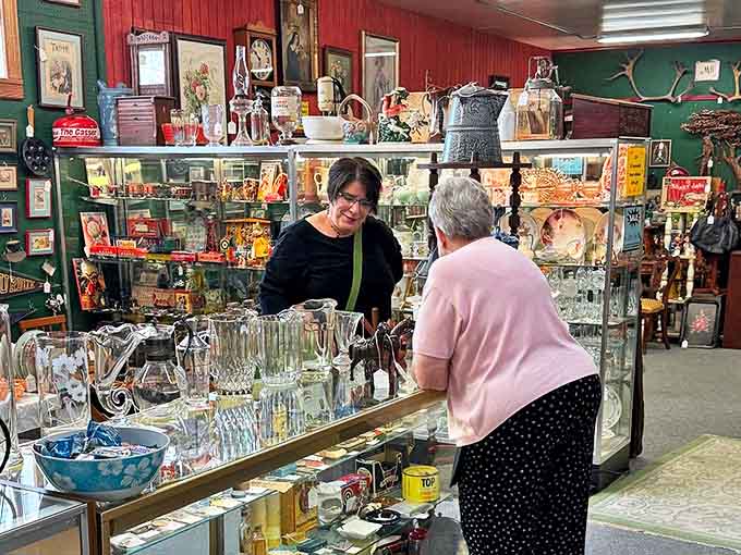 Glassware displayed behind protective cases because some things are too beautiful to risk, even if they were originally made for everyday use.