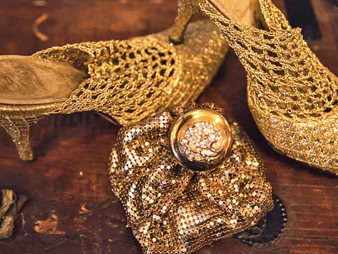 Glamour never goes out of style &ndash; these golden mesh shoes and matching evening purse await their next night on the town.