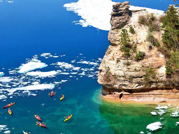 Winter transforms Lake Superior into a wonderland of ice floes, creating an ever-changing landscape that draws photographers and adventurers despite the cold.