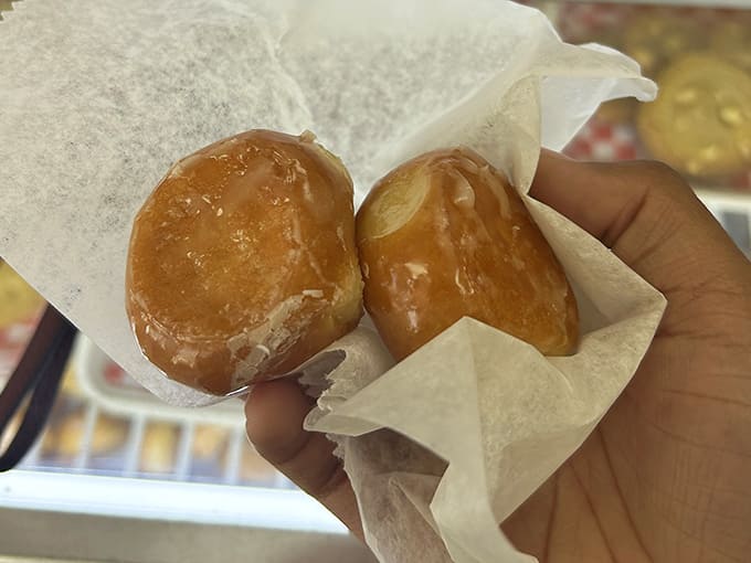 These mini glazed donuts aren't just breakfast &ndash; they're bite-sized happiness bombs that fit perfectly in your hand and your heart.