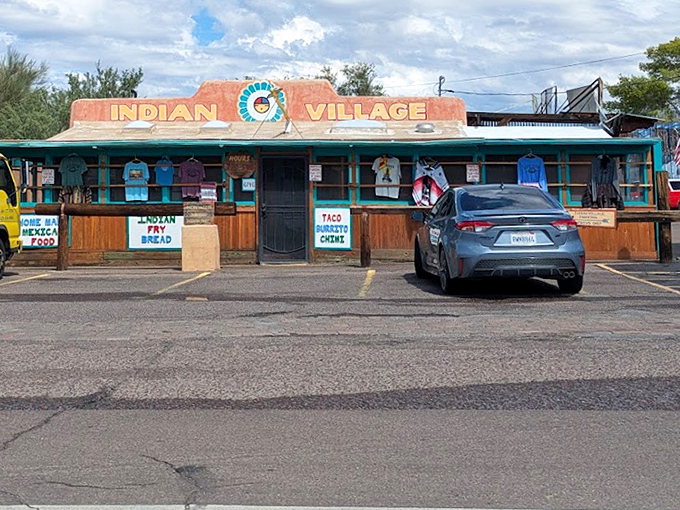 The exterior view reveals Indian Village's perfect desert setting, where the building seems to have grown organically from the Arizona landscape.