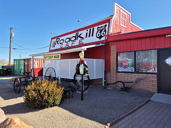 The exterior beckons with its "Get Shop Inside" sign and vintage wagon wheel displays &ndash; Route 66 Americana at its most authentic and inviting.