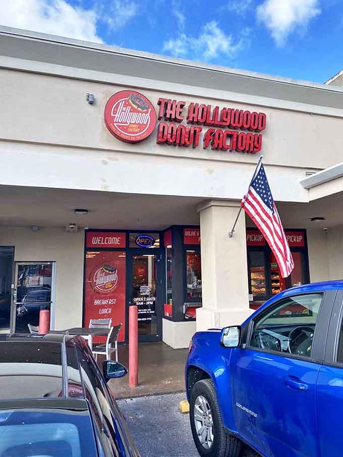 The humble storefront that countless cars drive past daily, unaware of the culinary magic happening just beyond those brick columns.