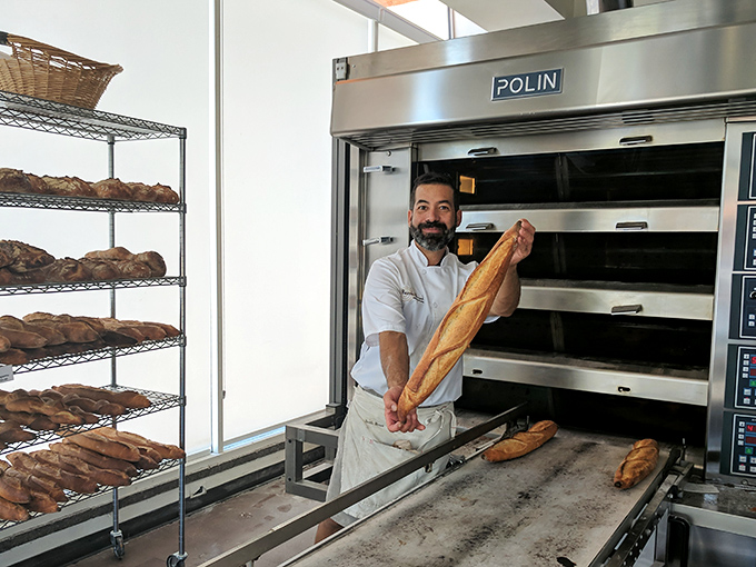 The bakery's oven &ndash; not just equipment but a sacred space where transformation happens, where dough becomes the stuff of legend.