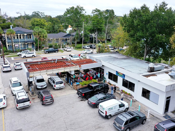The democratic mix of vehicles in T-Ray's lot tells the first chapter of its story &ndash; good food brings people from all walks of life together.