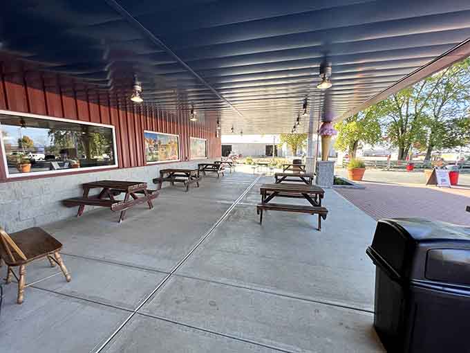 The patio invites lingering under Arizona skies, where desert trees provide dappled shade perfect for post-biscuit contemplation.