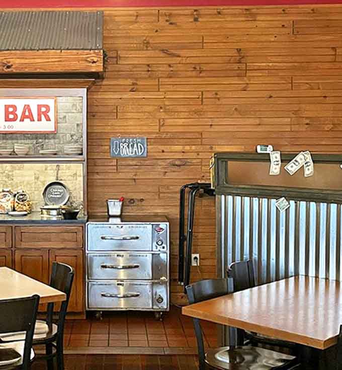 The soup bar area showcases the restaurant's rustic charm with wooden accents and homey touches throughout.