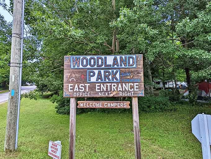 The gateway to relaxation: This unassuming sign marks the entrance to what many consider Michigan's most perfect blend of forest and shoreline camping.