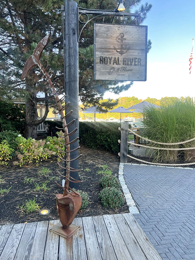 The Royal River Grill House sign welcomes visitors with a promise of exceptional dining in a setting that celebrates coastal heritage.
