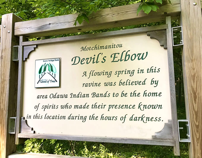 Devil's Elbow sign reveals local lore – where Odawa spirits supposedly made their presence known during the darkening hours.