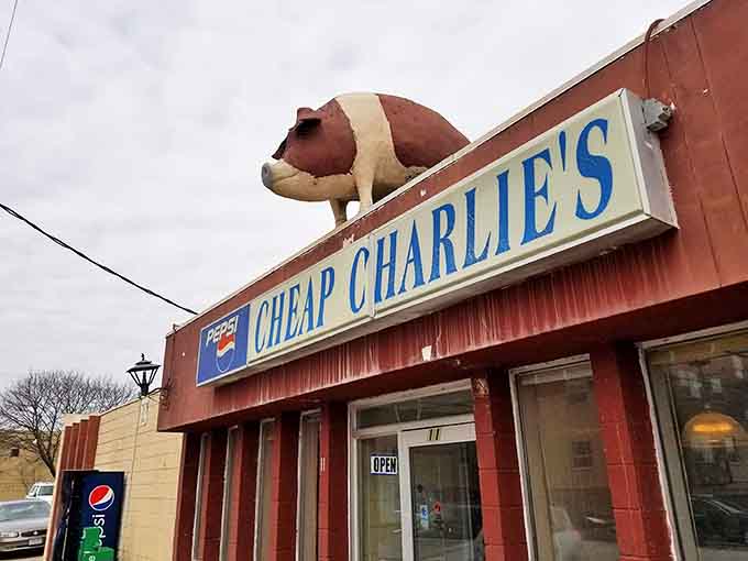 Signage and Pig Decor: The unmistakable Cheap Charlie's marquee with its porcine guardian watching over hungry visitors below.