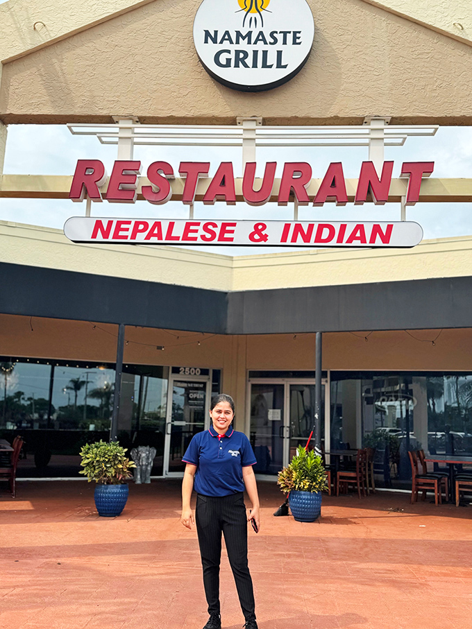 A friendly face greets guests outside Namaste Grill &ndash; where hospitality is as authentic as the cuisine waiting inside.