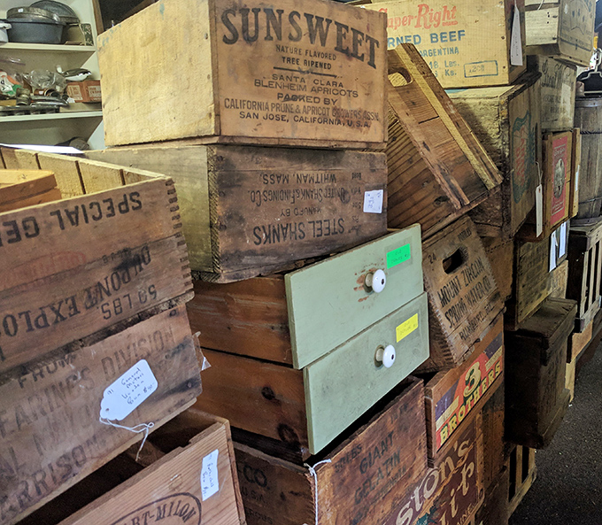 Wooden crates from America's agricultural past stack like historical building blocks &ndash; each stamped with forgotten brands and distant orchards.
