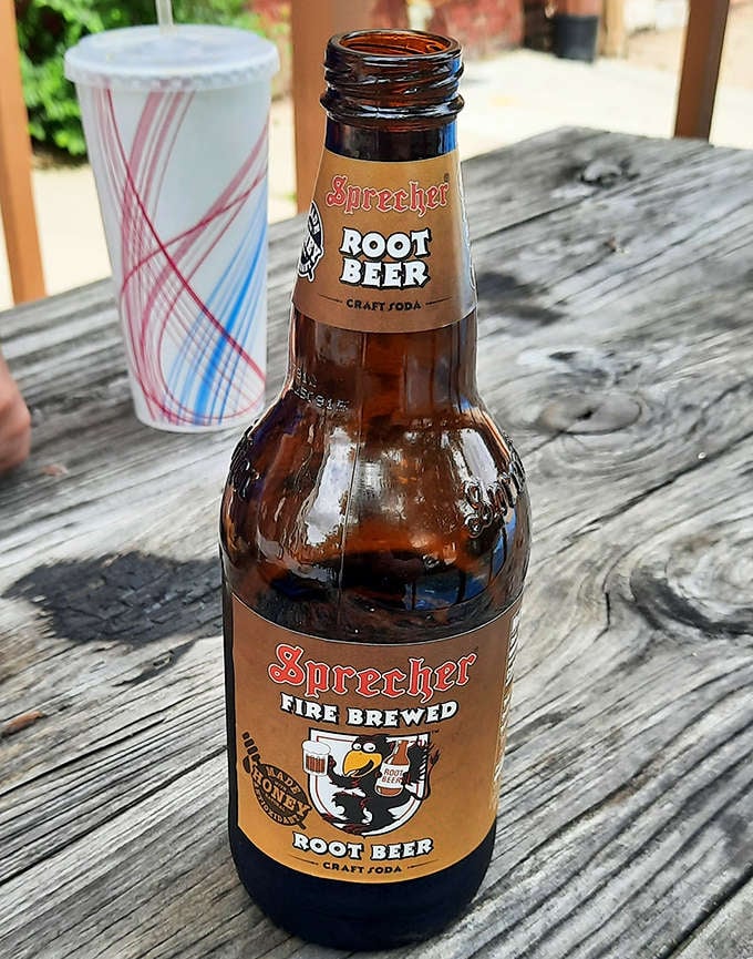 A bottle of Sprecher root beer &ndash; the perfect companion to any Coney Island meal, offering craft soda satisfaction with notes of vanilla and honey.