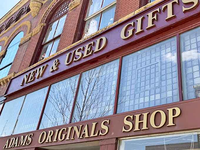 The distinctive signage of Adams Originals Shop promises both "NEW & USED GIFTS," though what it really offers is a ticket to your childhood.