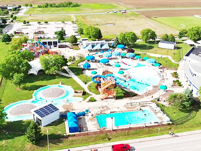 From this bird's-eye view, the park reveals itself as a blue oasis amid the green landscape &ndash; a refreshing escape from summer's heat.