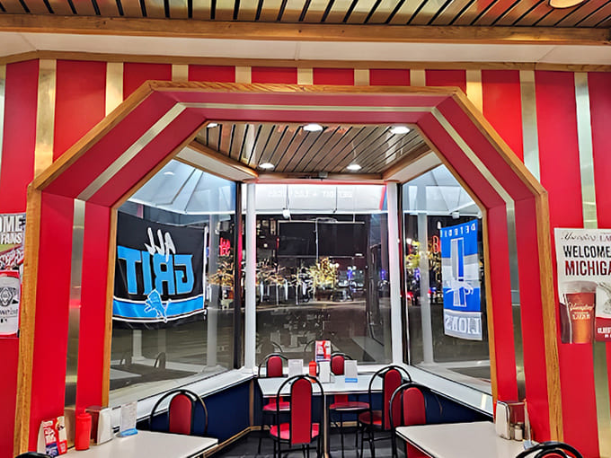 The entrance frames a portal to culinary happiness &ndash; red, white, and blue decor signals you're about to experience an authentic piece of Detroit's food heritage.