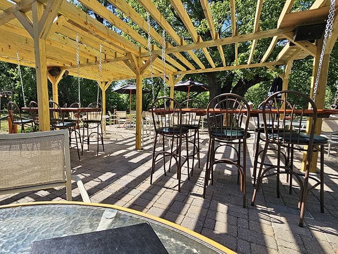 Outdoor patio seating under pergolas lets you dine al fresco when Minnesota weather decides to cooperate for once.