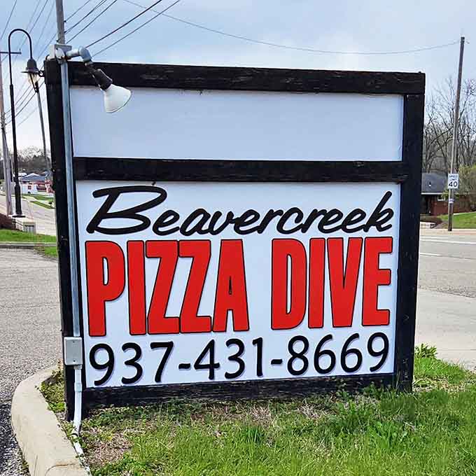 The Beavercreek Pizza Dive sign stands as a beacon for pizza pilgrims seeking authentic New York slices in the heart of Ohio.