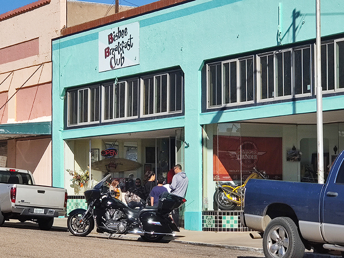Motorcycles and pickup trucks line up outside the Bisbee Breakfast Club, where hearty morning meals have fueled explorers for decades.