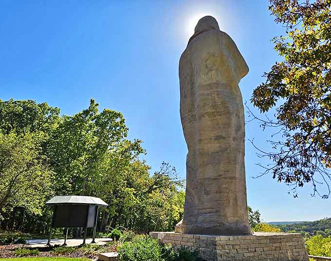 The sheer scale becomes apparent when you realize those tiny specks at the base are actual people admiring this concrete giant.