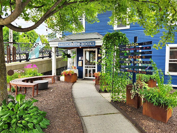 Bridgeside Books creates a literary oasis with its blue fa&ccedil;ade and whimsical garden entrance &ndash; a bibliophile's dream destination.