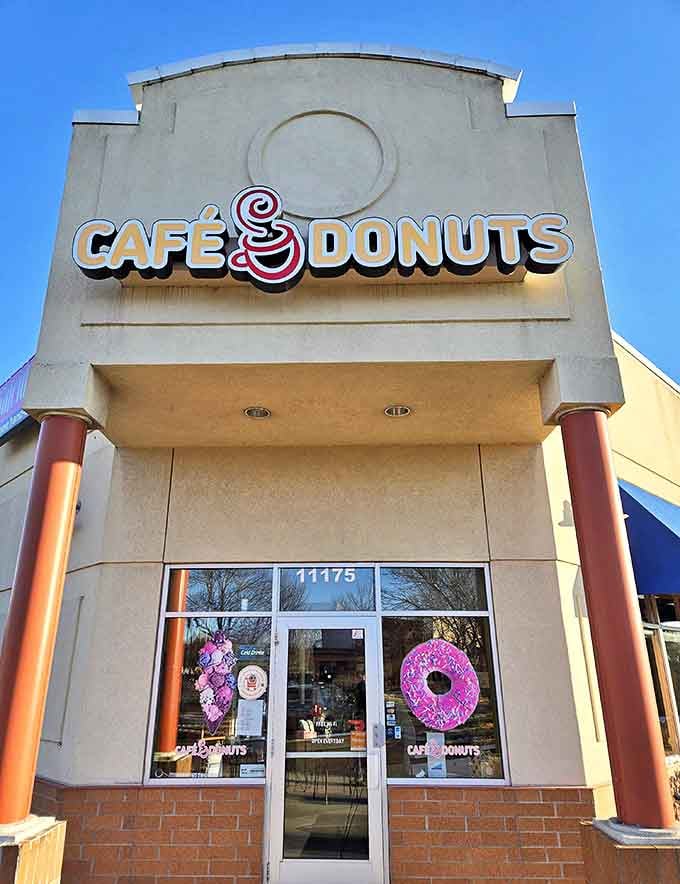 Sunshine illuminates the Caf&eacute; Donuts storefront, a local landmark that's been satisfying Champlin's sweet cravings with handcrafted delights.