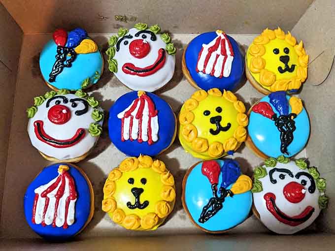 Circus-themed donuts featuring clowns, tents, lions, and popcorn, because sometimes breakfast should feel like running away to join the circus.