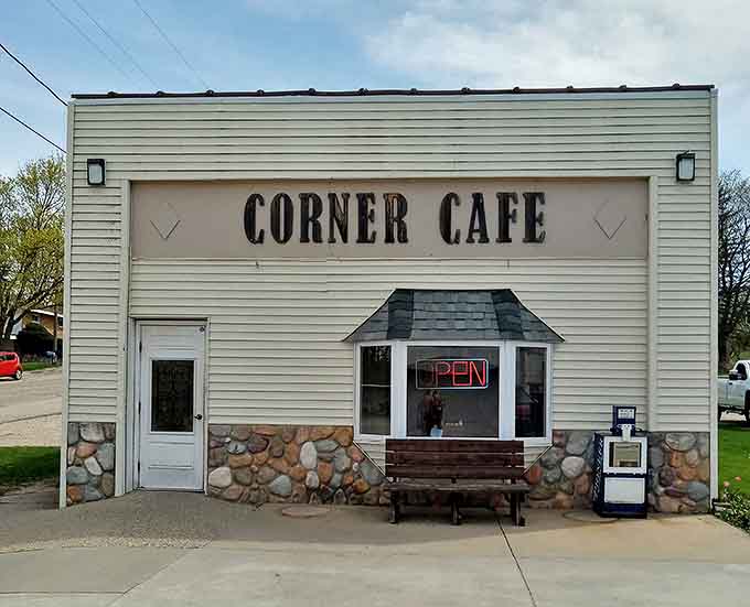 The Corner Cafe welcomes hungry travelers with its simple signage and wooden bench &ndash; small town hospitality at its finest.